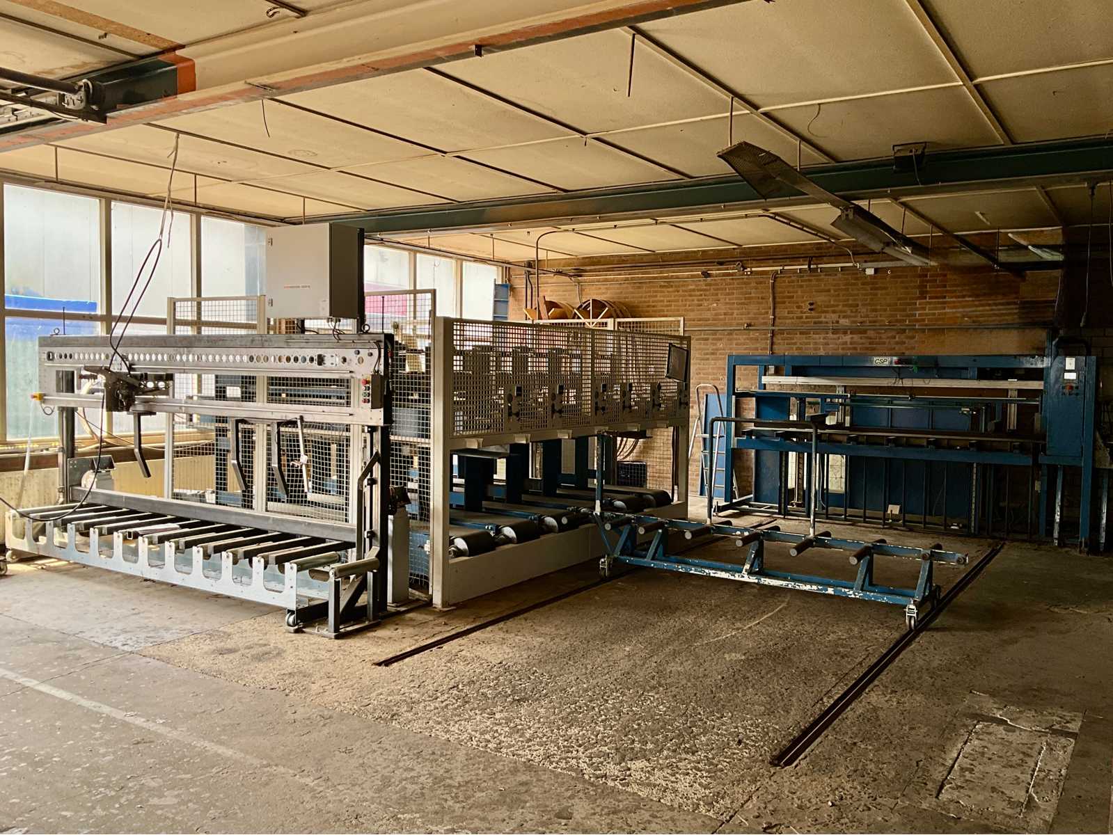 Due to cessation of business, woodworking machines, tools and materials